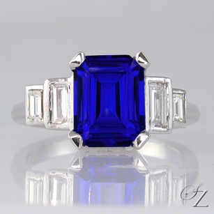 Emerald Cut Tanzanite And Diamond Ring - Rare Gemstone Company